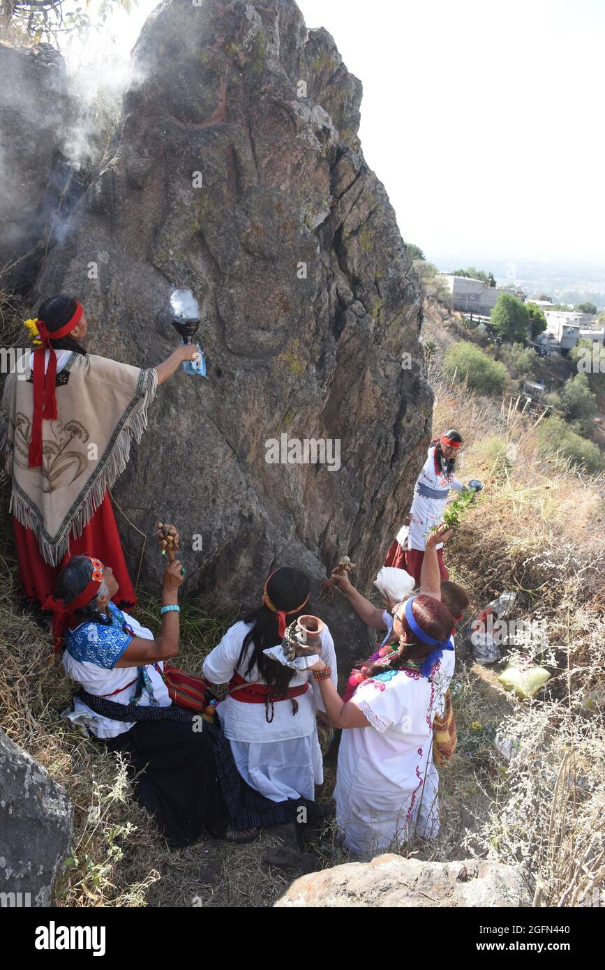 Curanderas—traditional healers or shamans—perform a ritual in front of ...