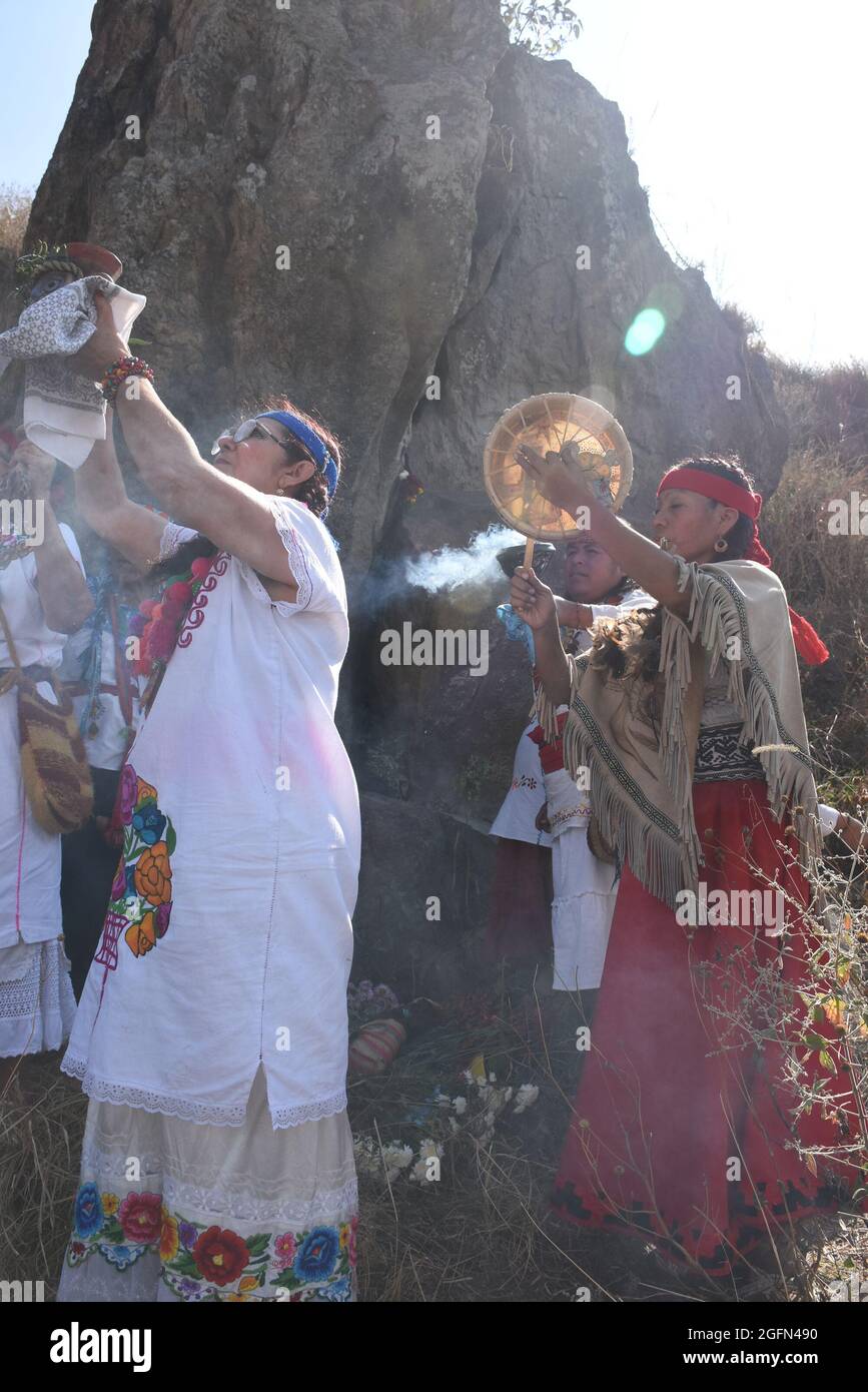 Curanderas—traditional healers or shamans—perform a ritual in front of ...