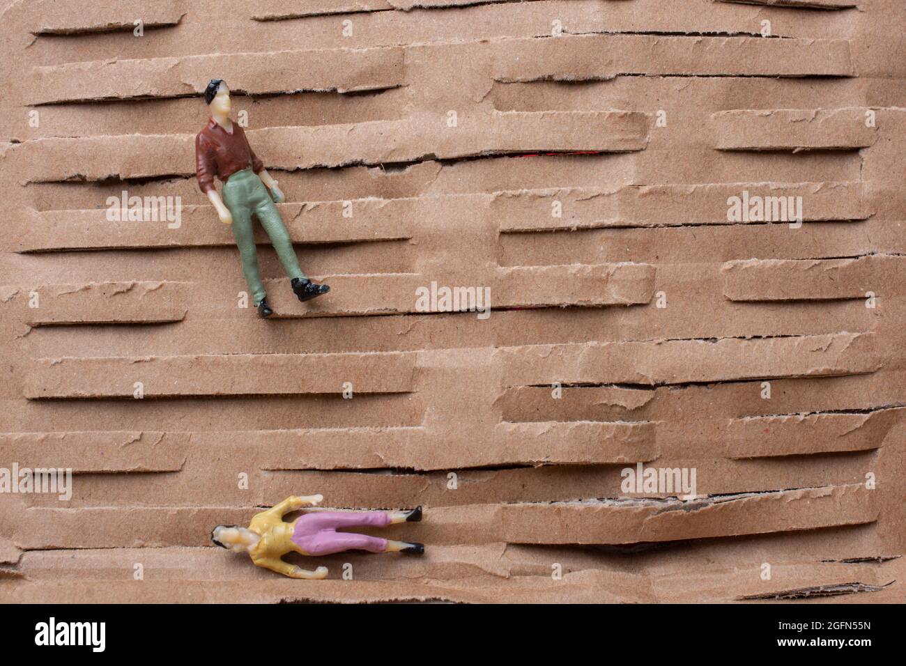 Tiny figurine of man and woman miniature model in view Stock Photo - Alamy