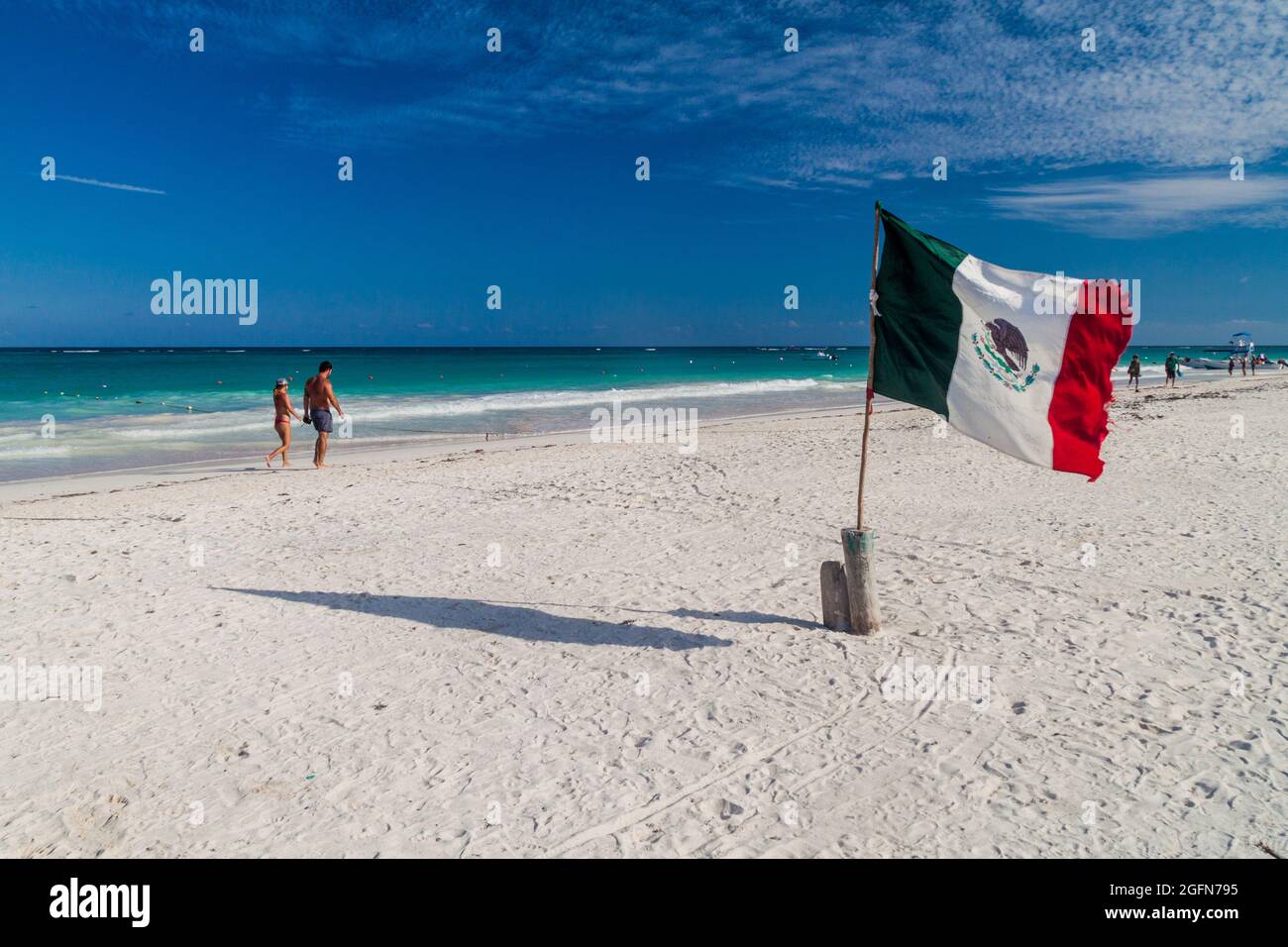 TULUM, MEXIO - FEB 29, 2016: Mexican flag at the Caribbean beach in ...