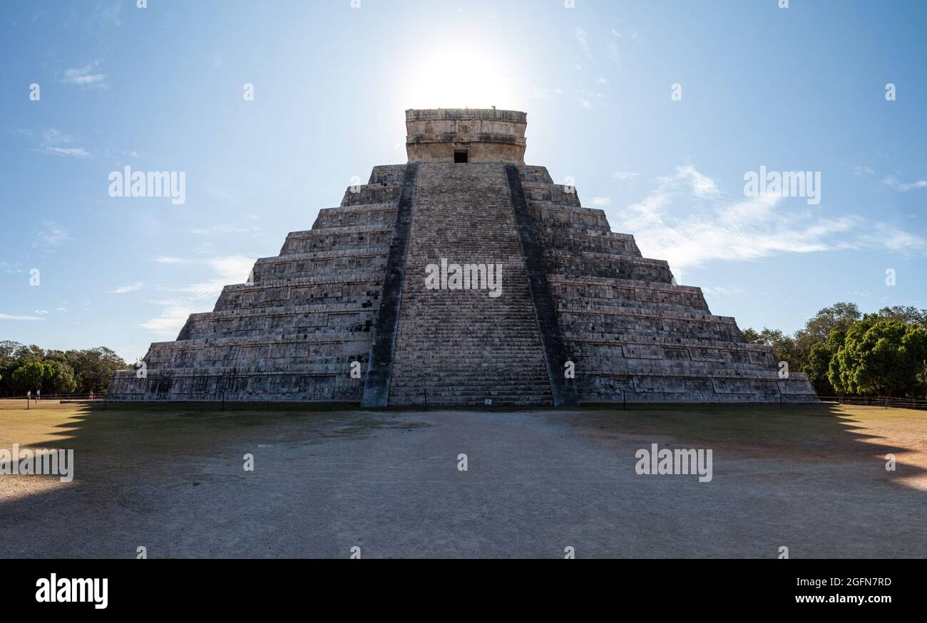 Early morning shadow of the pyramid Kukulkan in the Mayan archeological ...