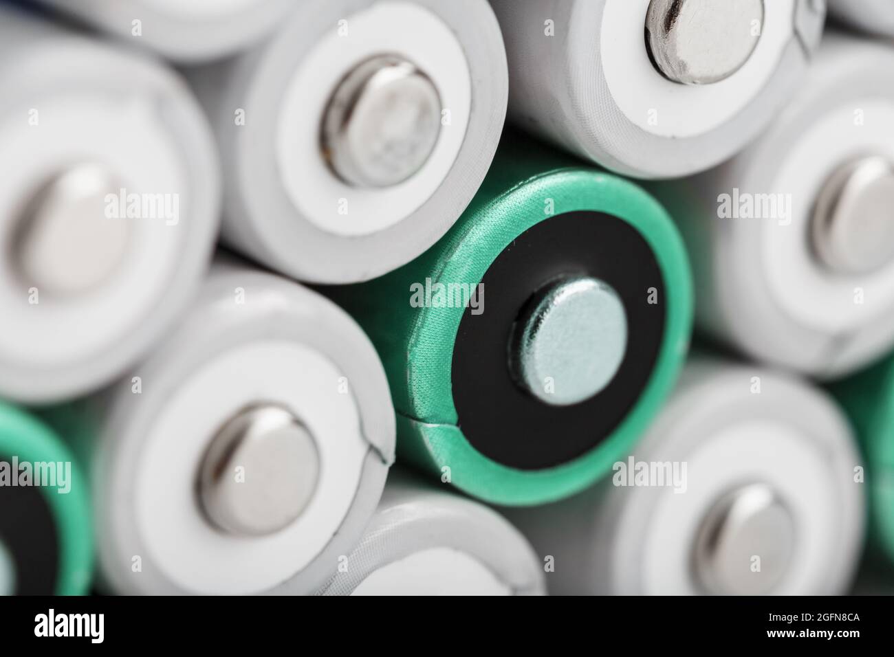 AA batteries as a texture background in full screen. The concept of ...