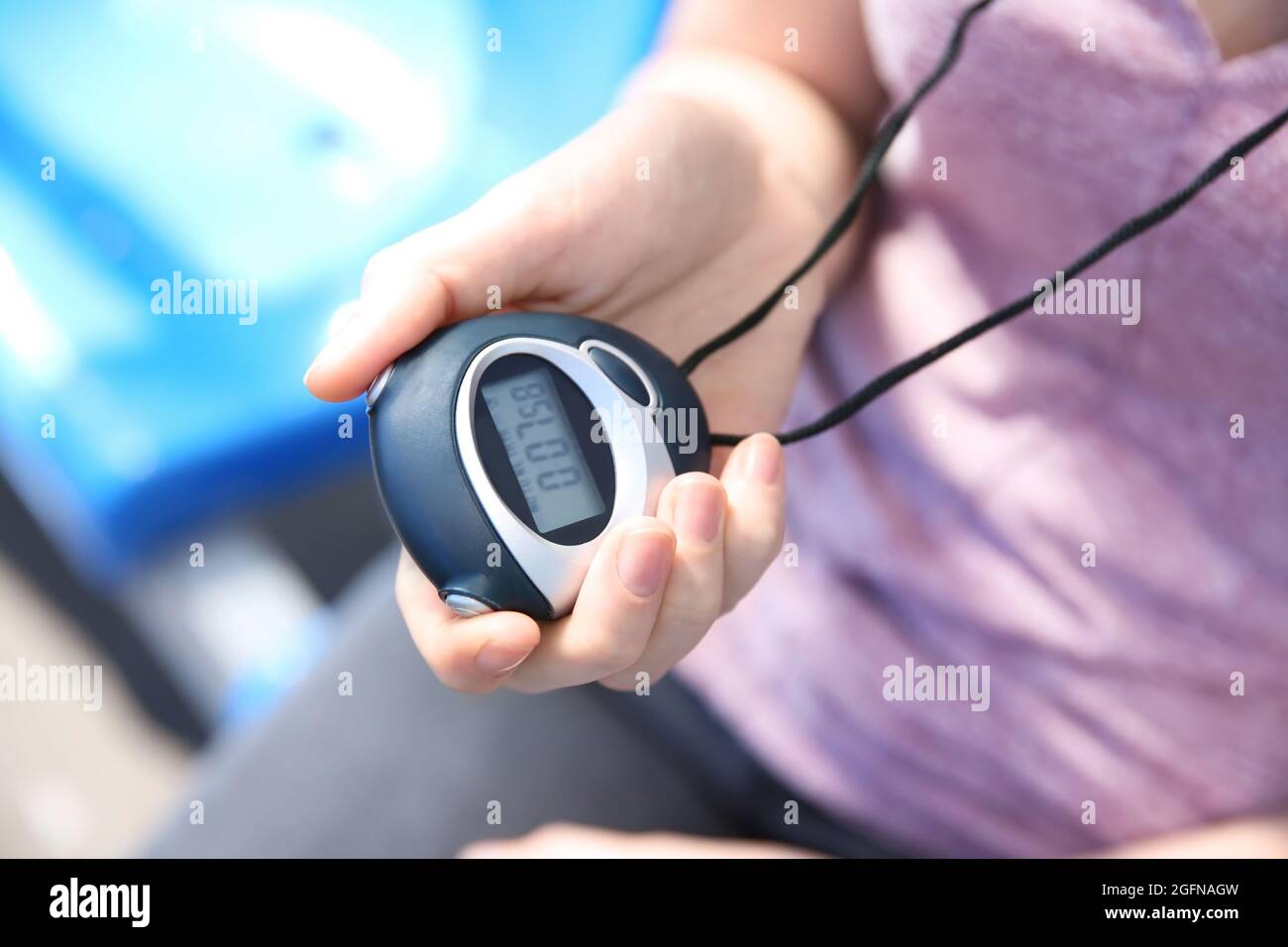 Female hand holding digital stopwatch, close up Stock Photo - Alamy