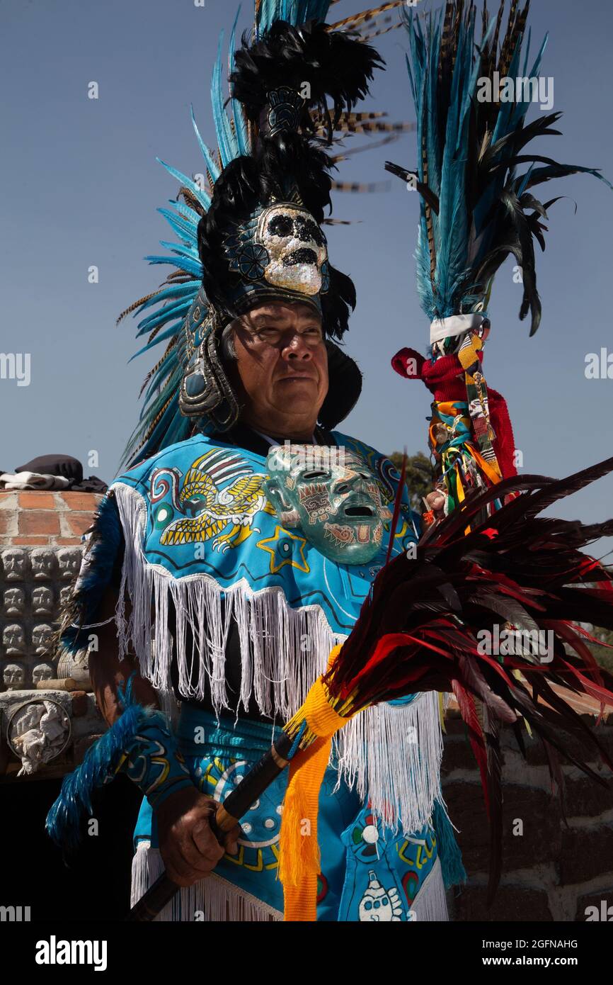 Teotihuacan, Mexico. 26th Aug, 2021. A man poses dressed as aztec ...