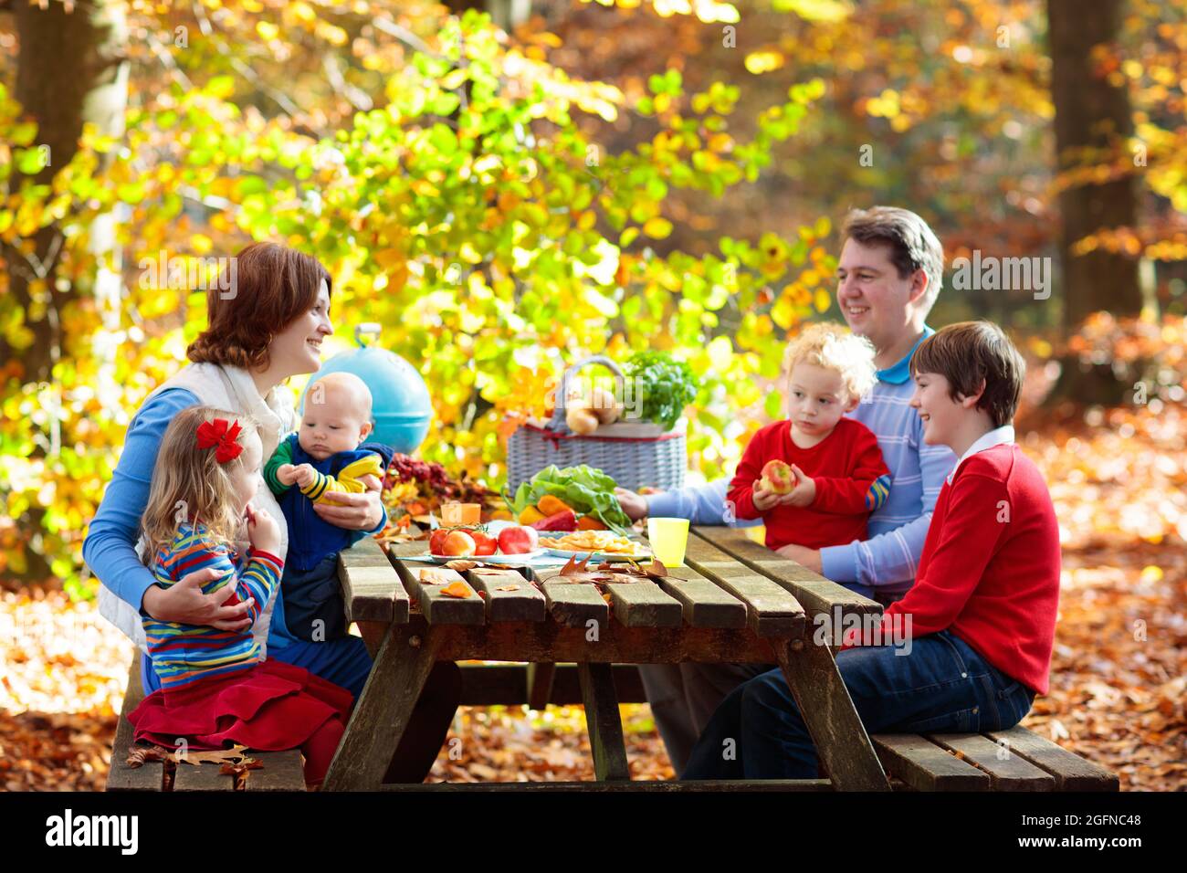 Picnic in autumn park. Family fall outdoor barbeque grill party ...