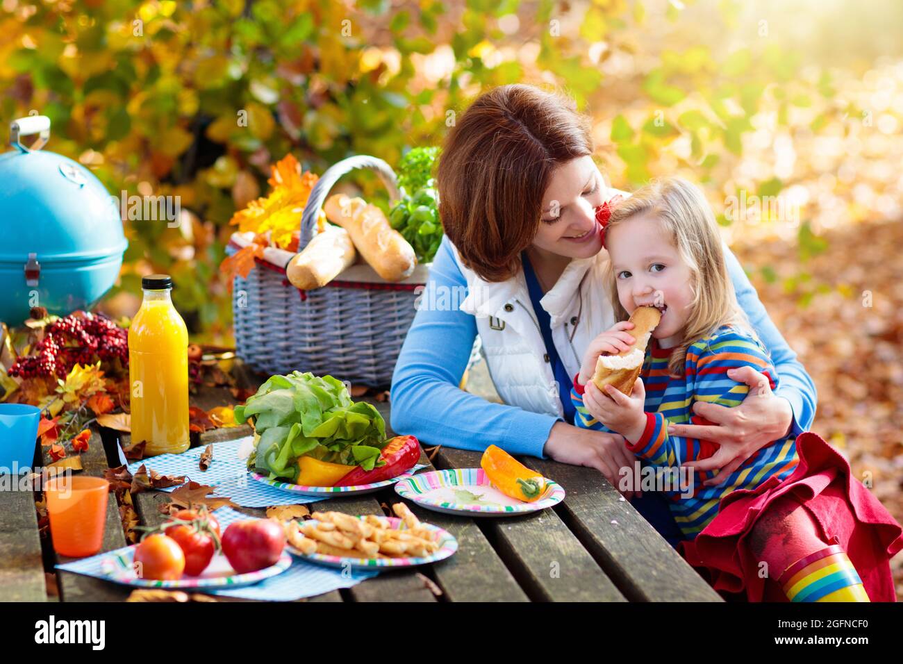 Picnic in autumn park. Family fall outdoor barbeque grill party ...