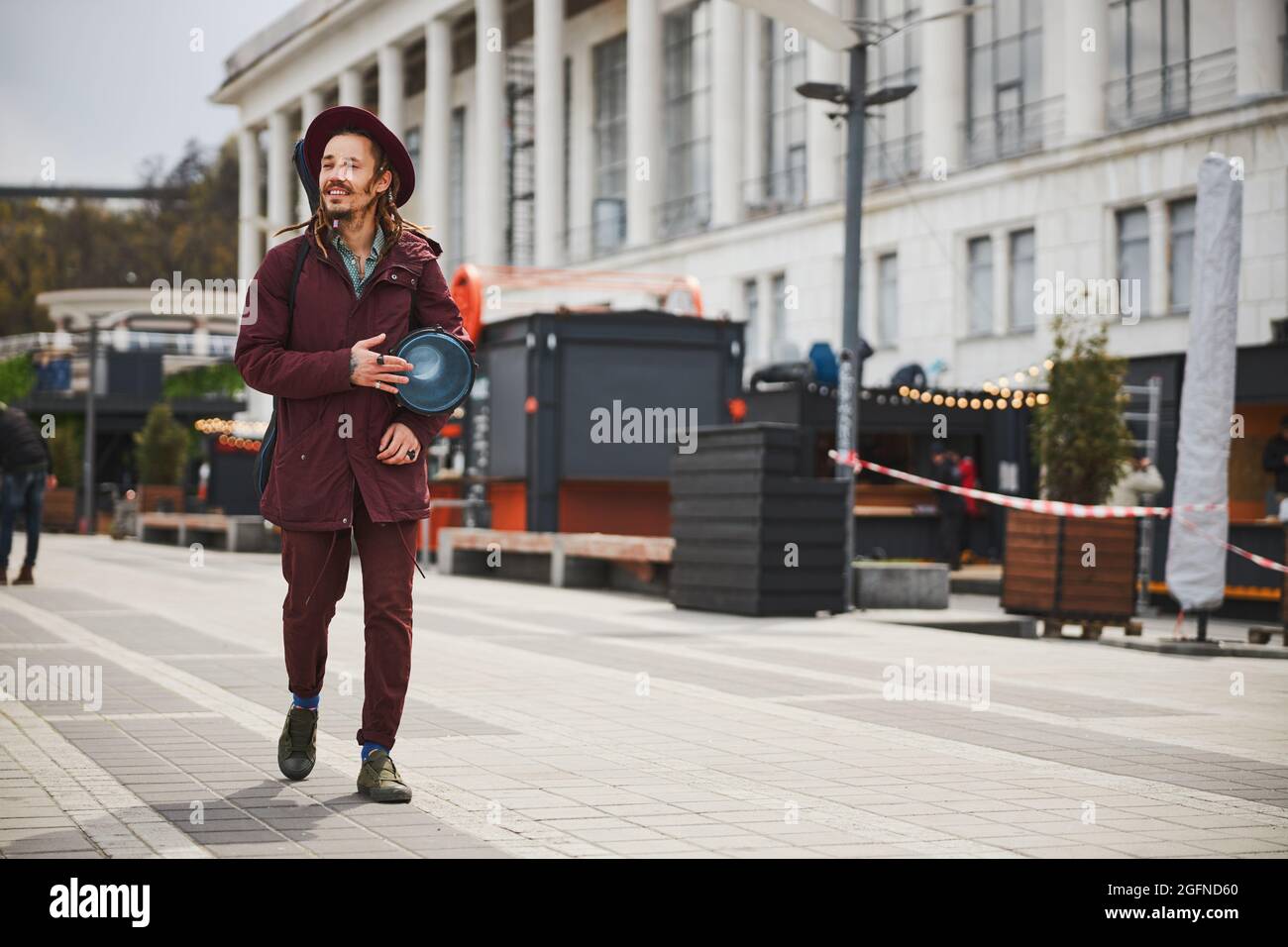 Kind brunette man demonstrating his friendly smile Stock Photo - Alamy