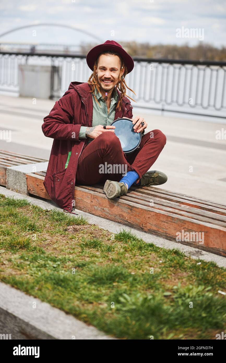 Happy male person looking straight at camera Stock Photo - Alamy