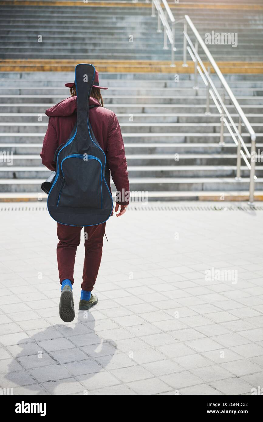 Kind male person walking on the street Stock Photo - Alamy