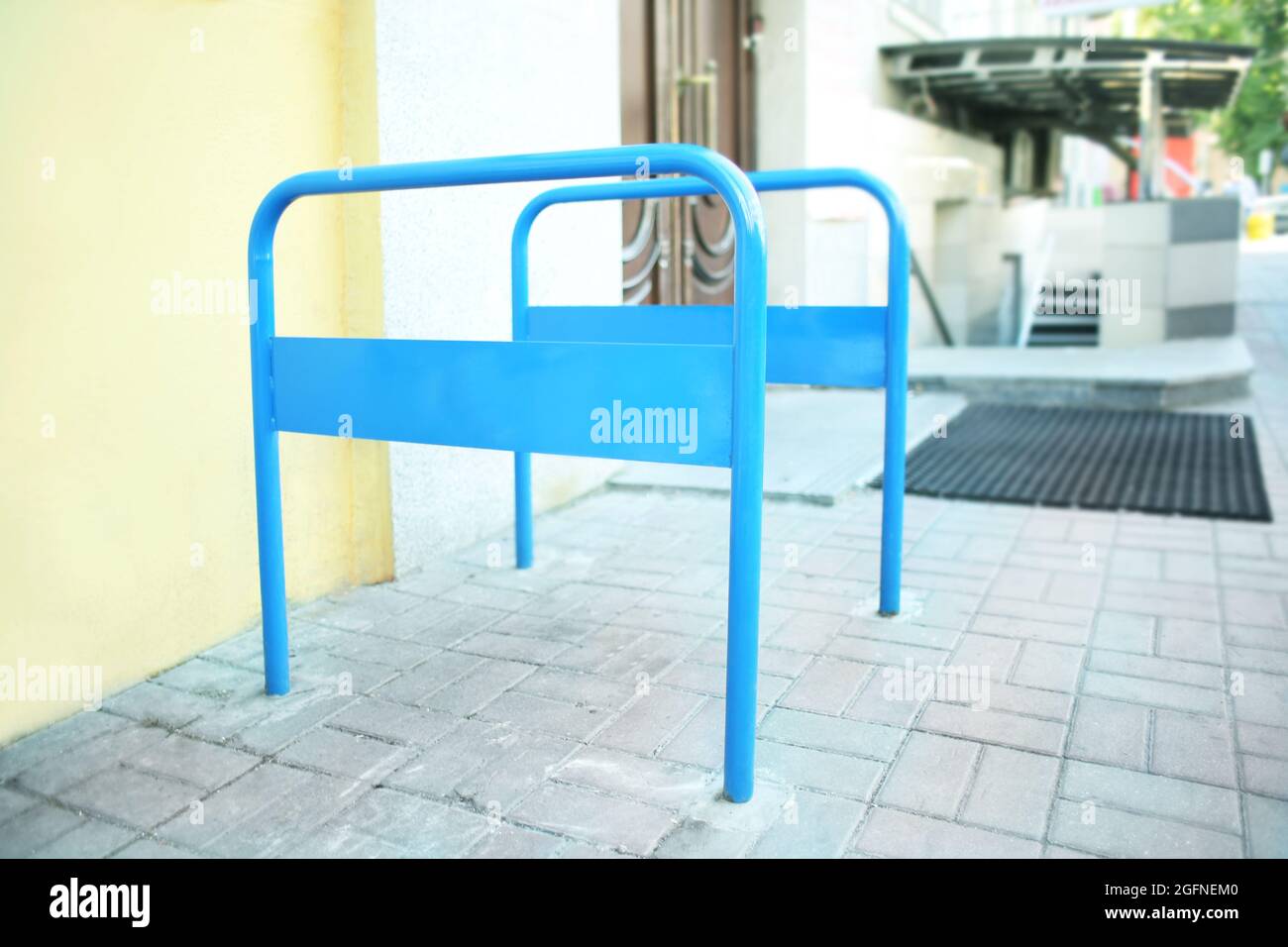 Metal public bike rack Stock Photo - Alamy