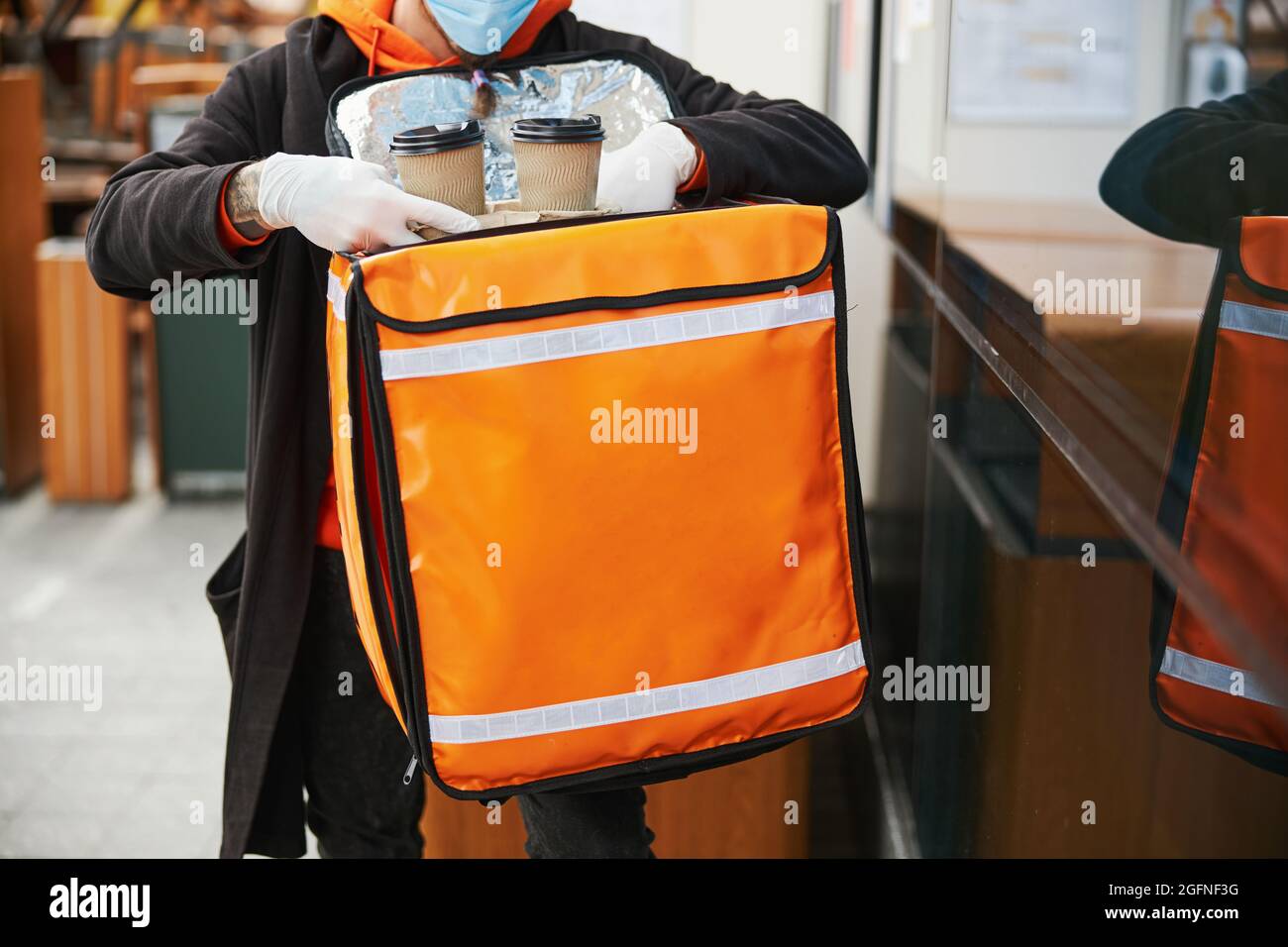 Delivery man packing up hi-res stock photography and images - Alamy