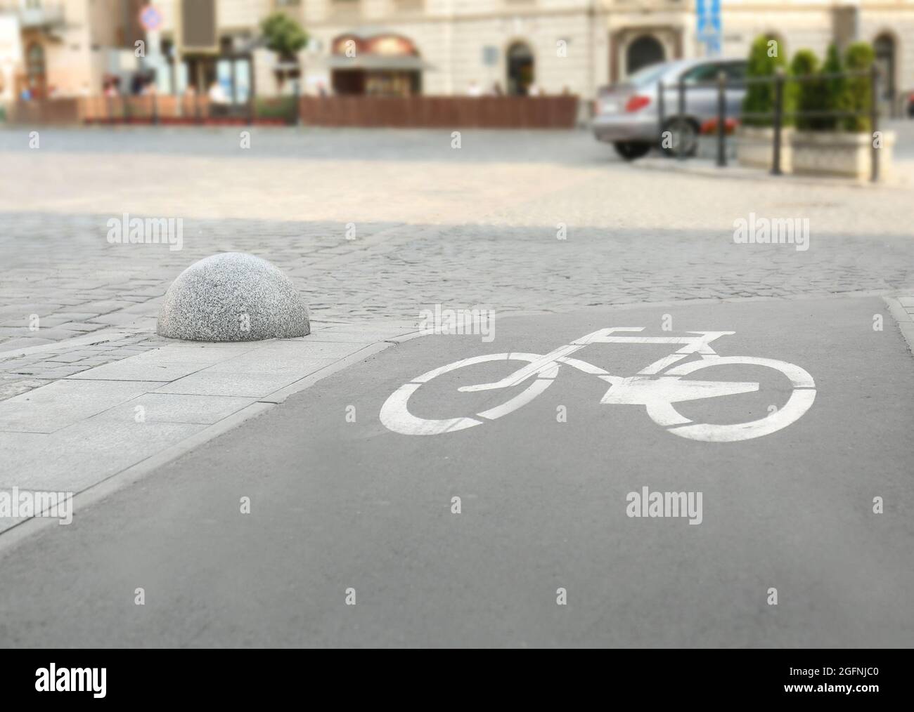Bicycle lane sign on street Stock Photo - Alamy