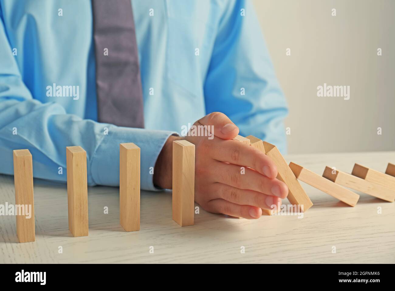 Toppling blocks hi-res stock photography and images - Alamy