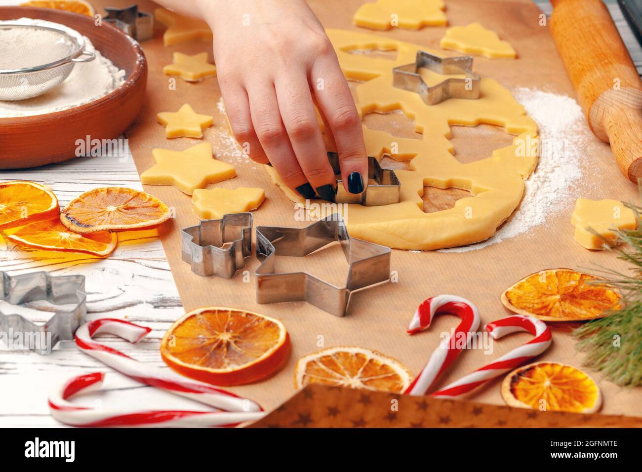 female hands making cookies from fresh dough at home Stock Photo - Alamy