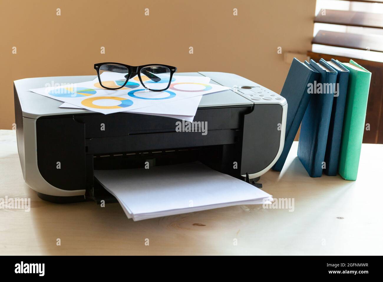 Close up of an office table with printer on it Stock Photo - Alamy