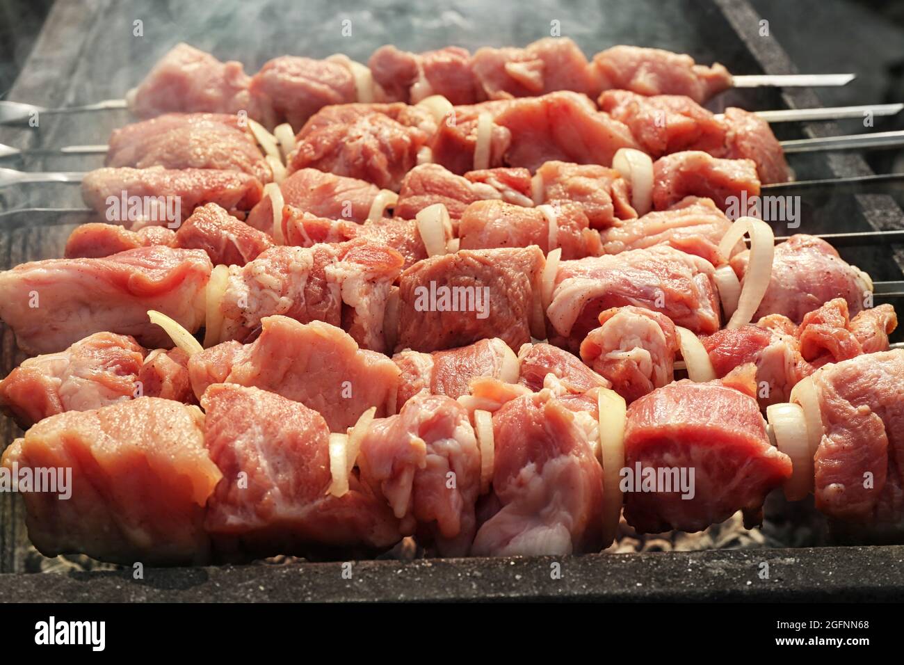 Raw barbecue in brazier outdoors Stock Photo - Alamy