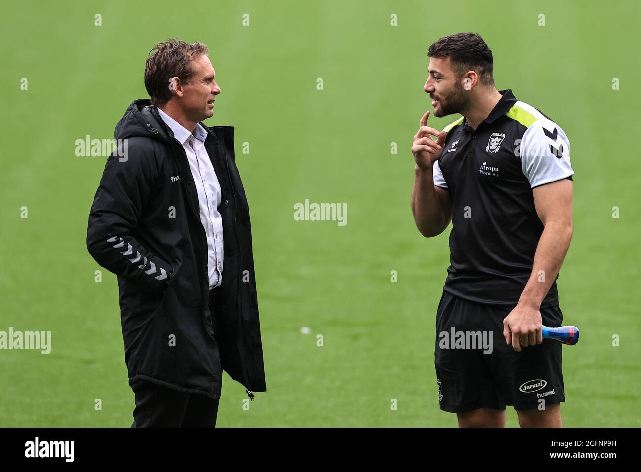 Brett Hodgson Head Coach of Hull FC speaks to Jake Connor (1) of Hull ...