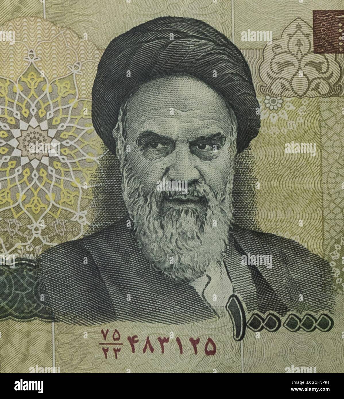 Close-up shot of the Iranian religious leader Ruhollah Khomeini on Rial ...
