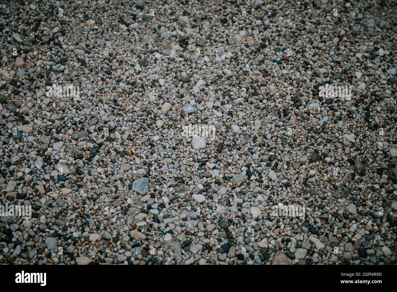 Gravel ground texture with pebbles and stones Stock Photo - Alamy