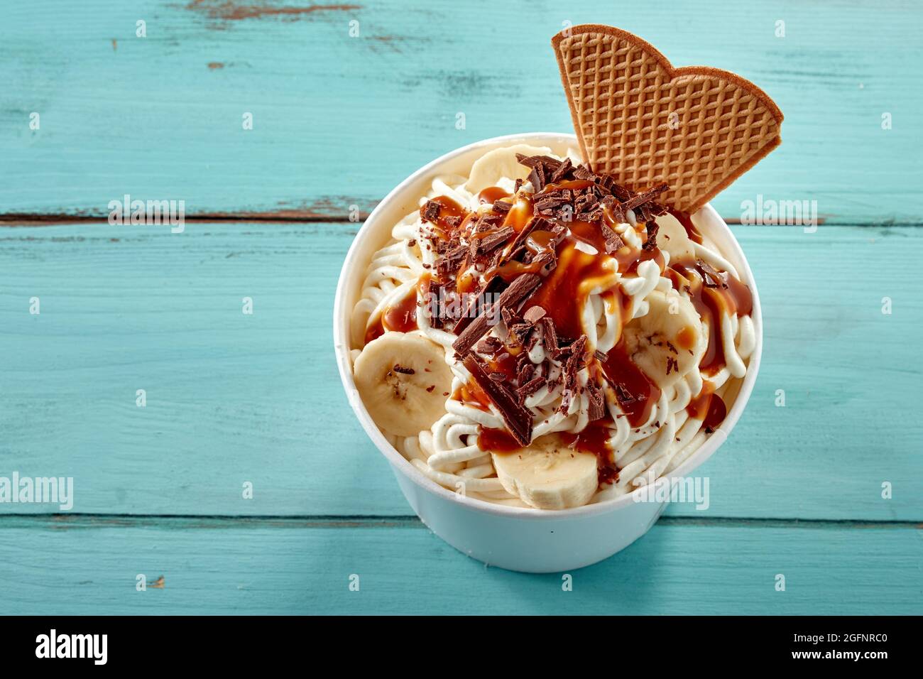 German vanilla spaghetti ice cream with chocolate flakes, caramel sauce ...