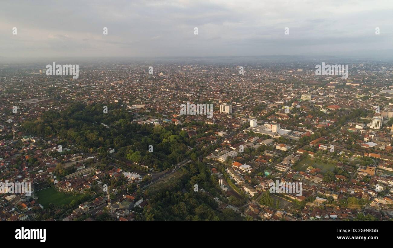 aerial view Yogyakarta with buildings and houses at sunset. urban ...