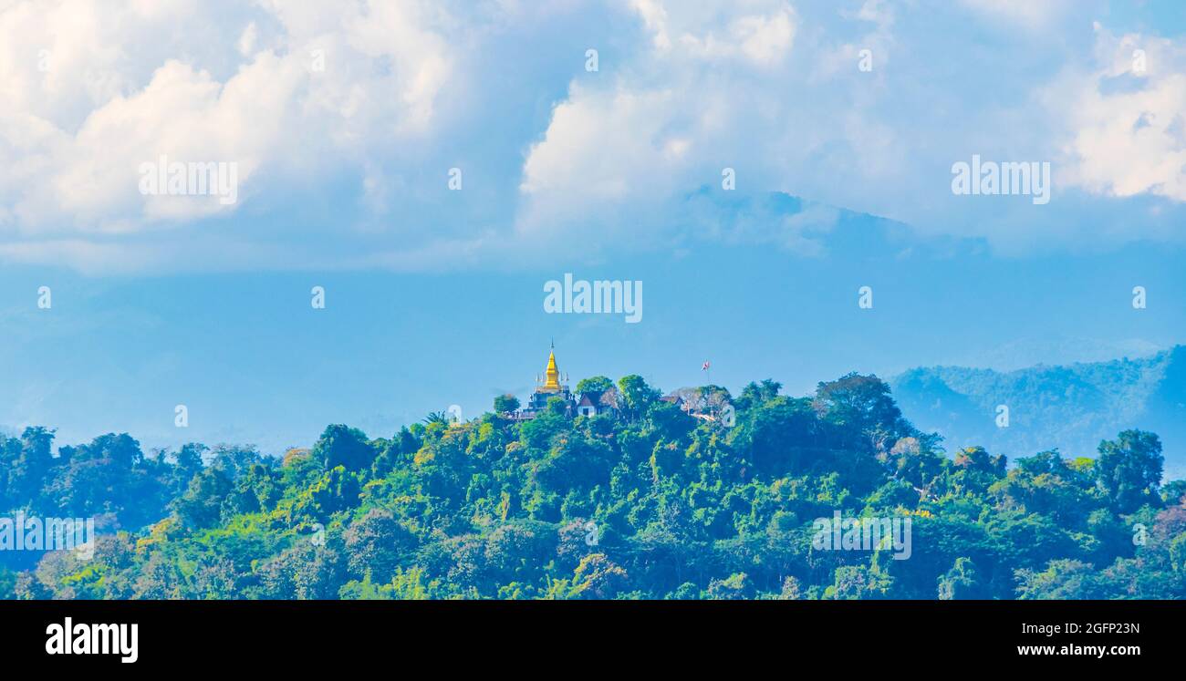 Panorama of the mountain Phousi Hill landscape and Wat Chom Si stupa in ...