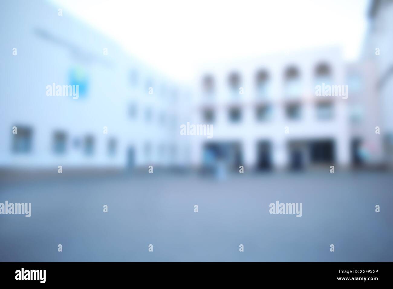 Blurred view of modern school building Stock Photo - Alamy