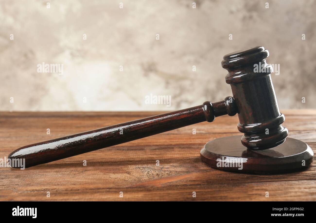 Court gavel and sound block on table Stock Photo - Alamy