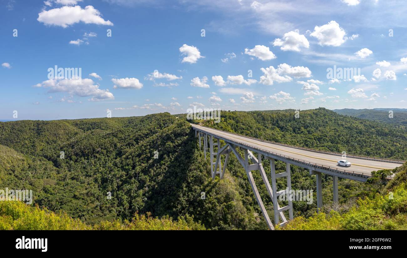 Scenic view of the famous Bridge of Bacunayagua in Cuba on a bright ...