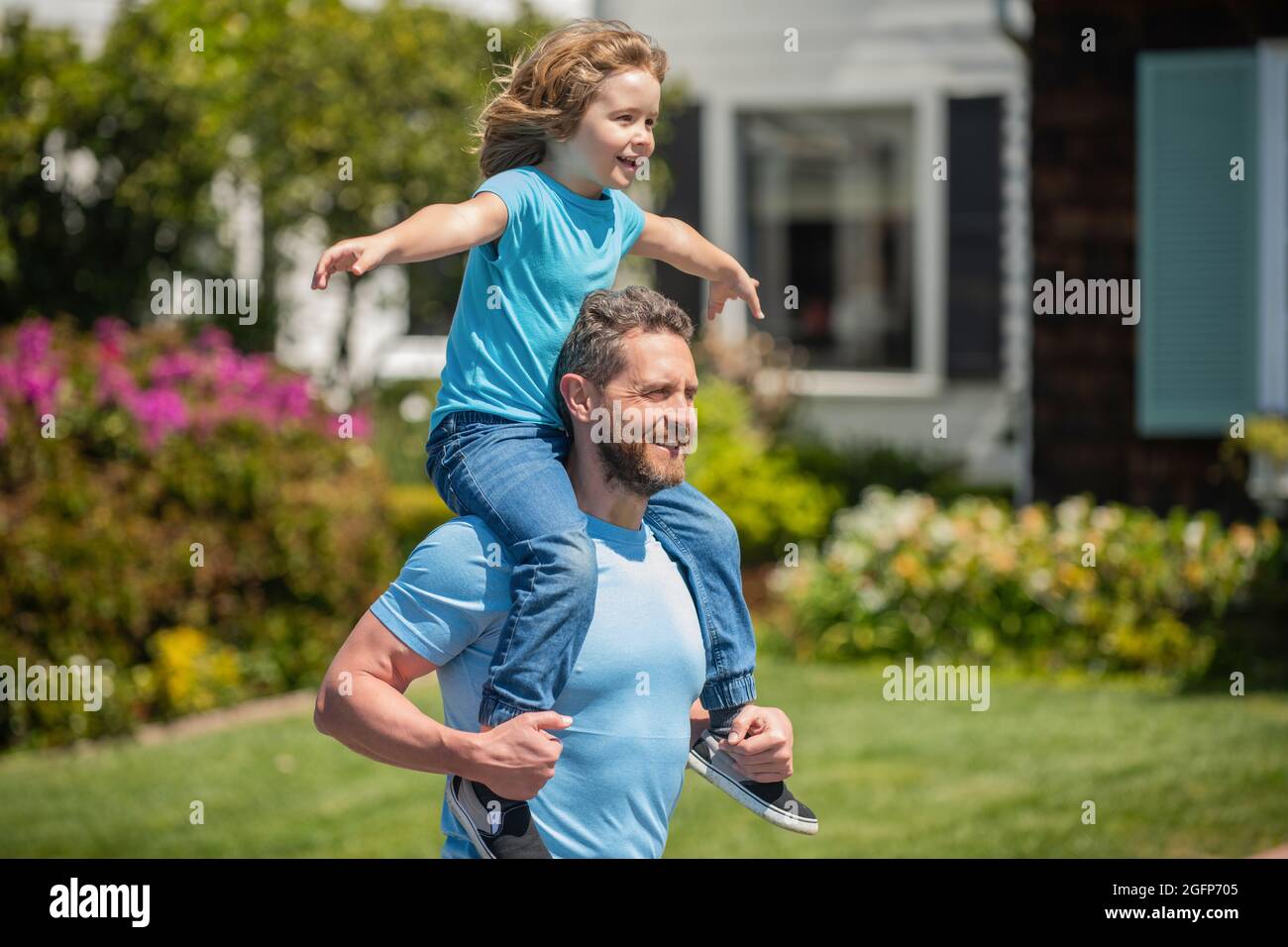 parent hold with small child boy. dad with kid on summer day. parenting ...