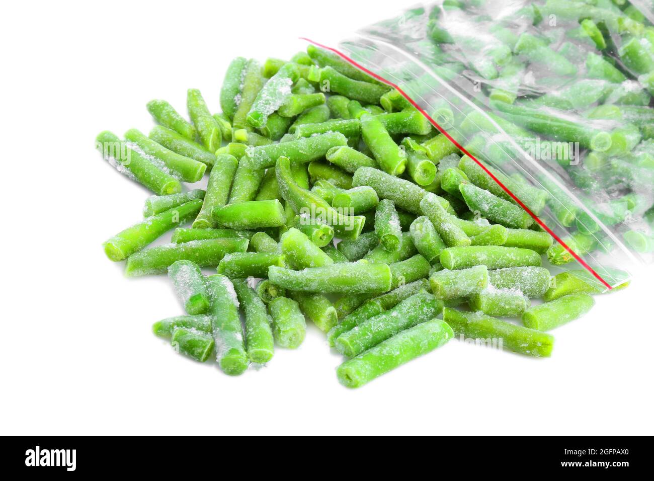 Frozen French beans on white background Stock Photo - Alamy