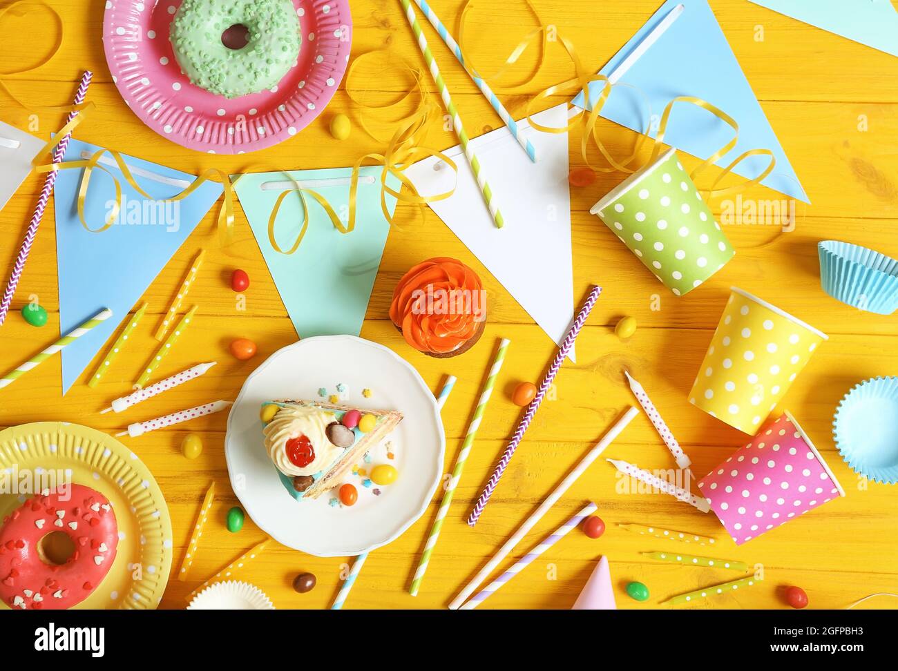Bright birthday background with sweets and decorations Stock Photo - Alamy