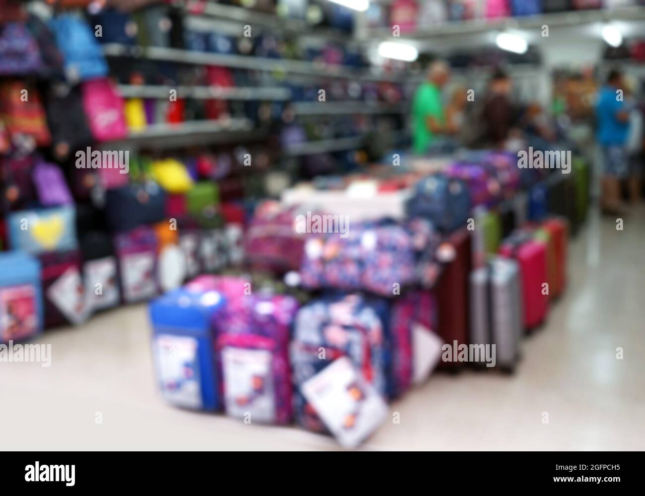 Blurred bags store background Stock Photo - Alamy