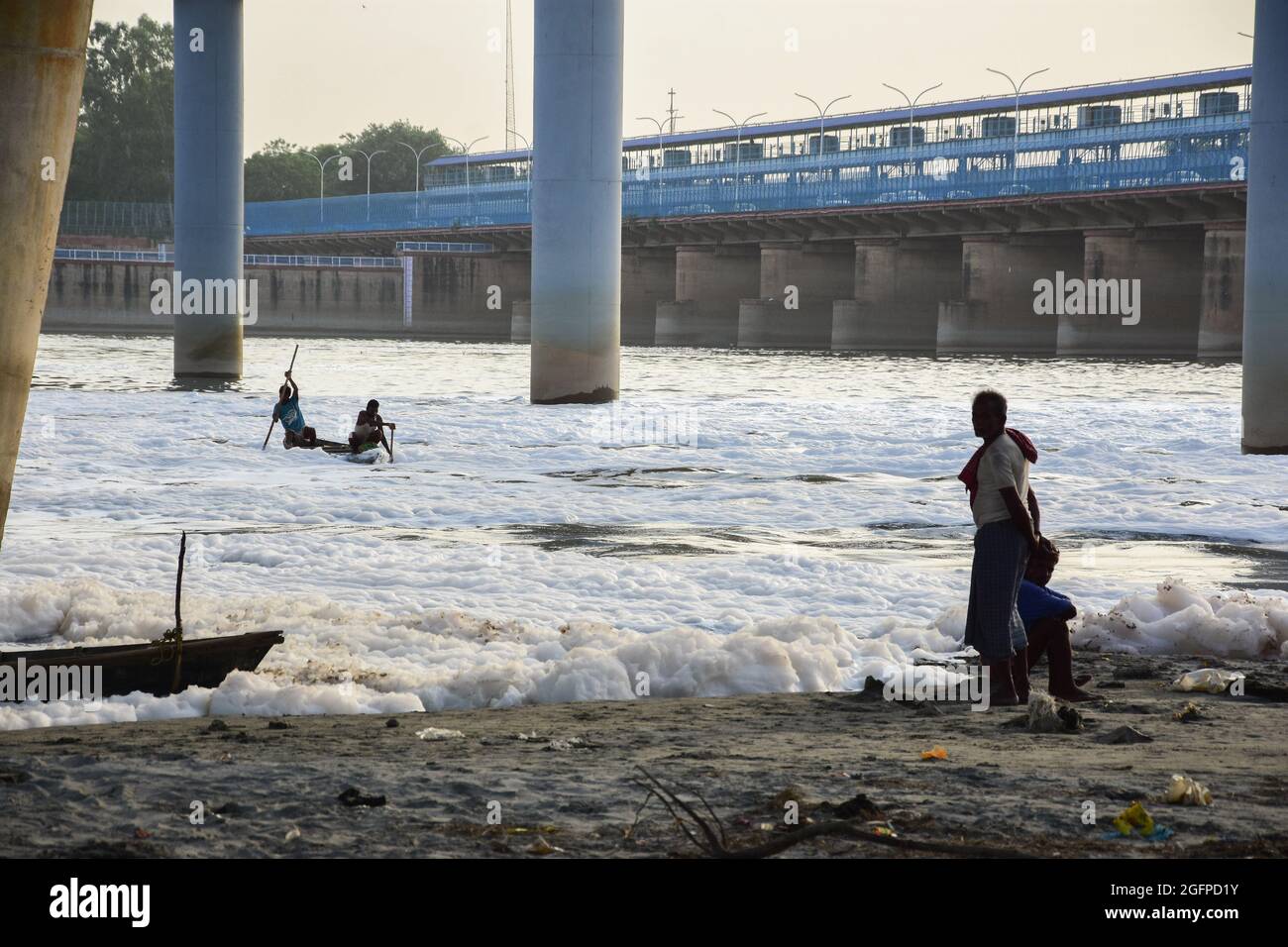 New Delhi, India. 26th Aug, 2021. Fisherman seen at work in the heavily ...