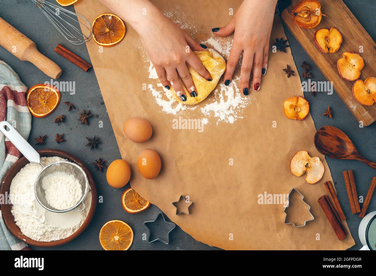 Womans hands rolling cookie hi-res stock photography and images - Alamy