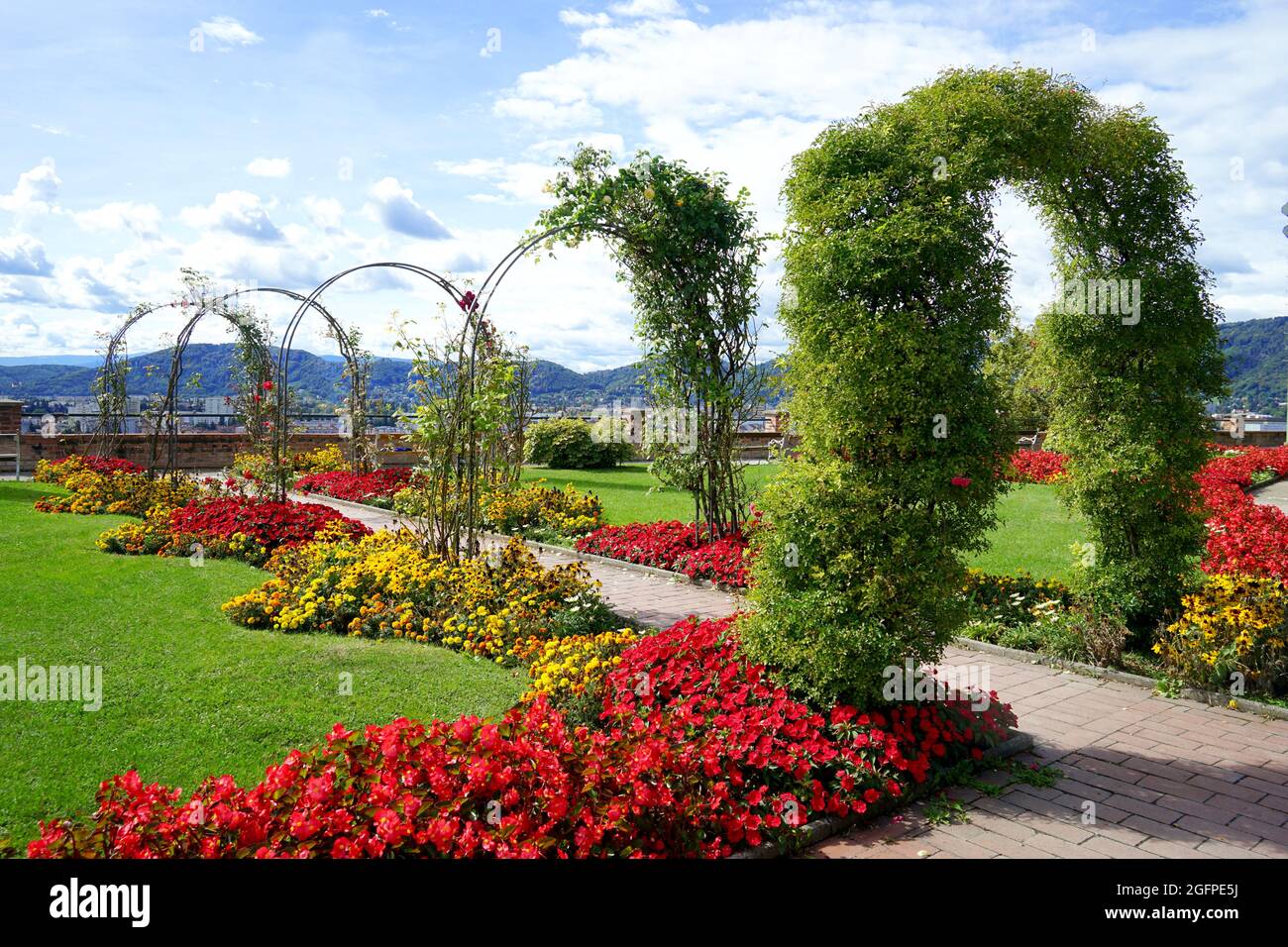 Floral arch in beautiful garden Stock Photo - Alamy