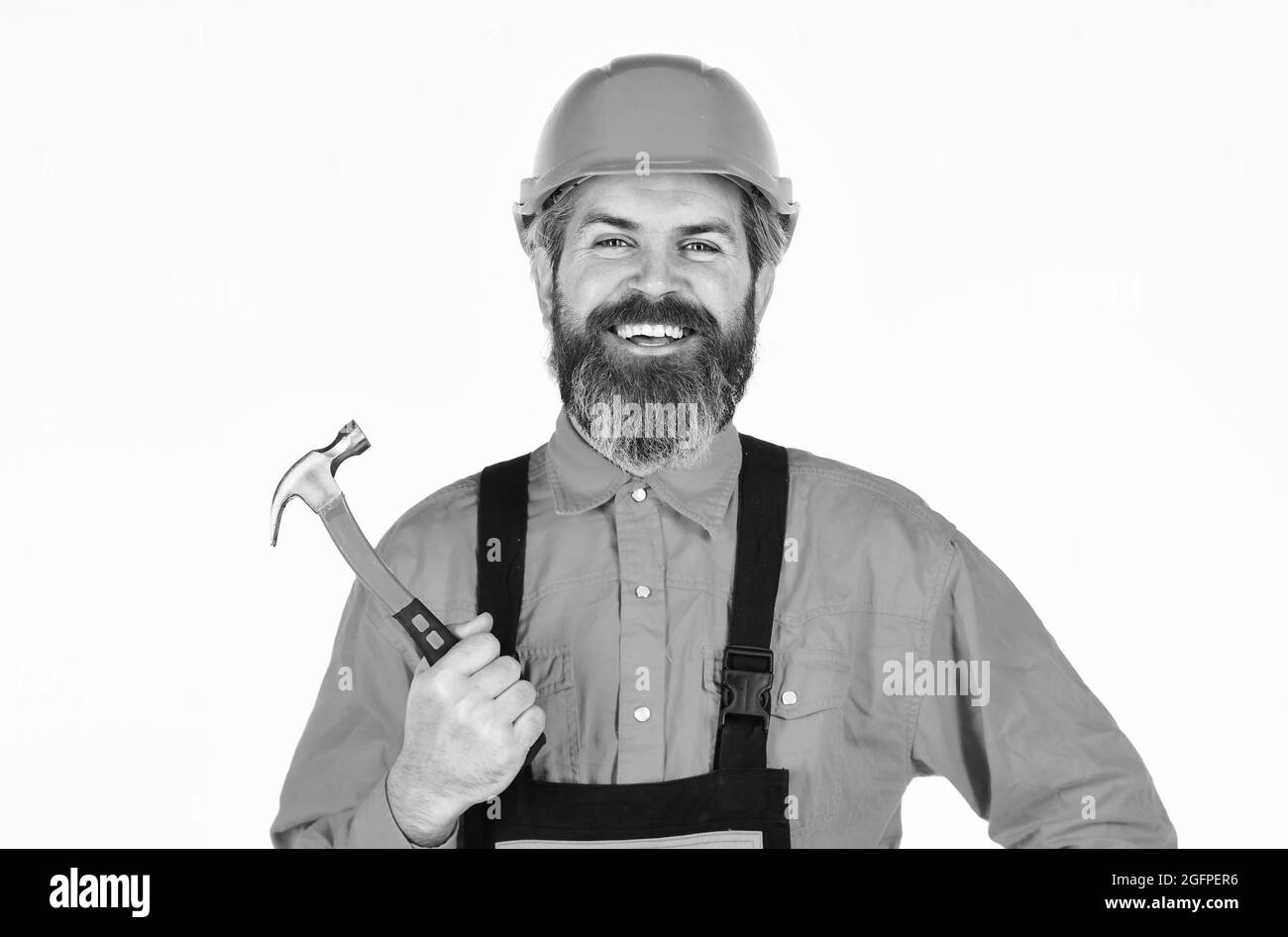 Technical work. Bearded mature man in uniform. Guy with hammer. Good ...