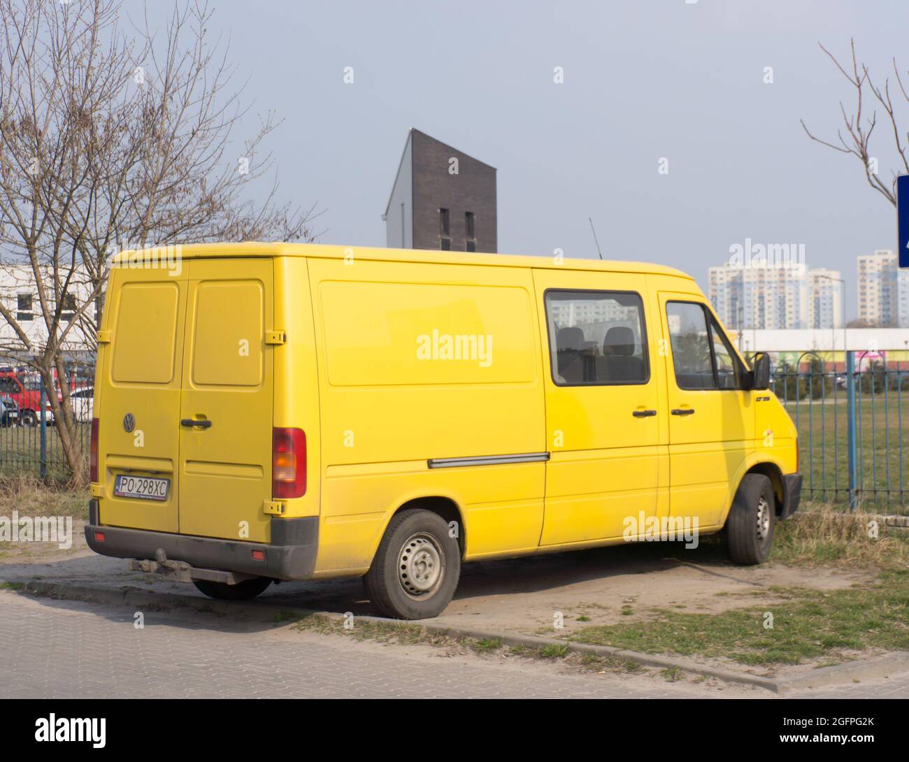 POZNAN, POLAND - Mar 21, 2015: A Parked yellow Volkswagen Transporter ...