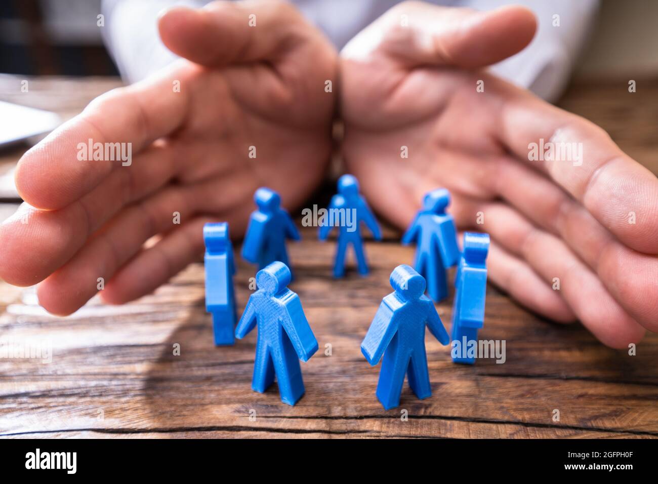 Protecting Employee Insurance Concept. Hands Protecting Human Stock ...