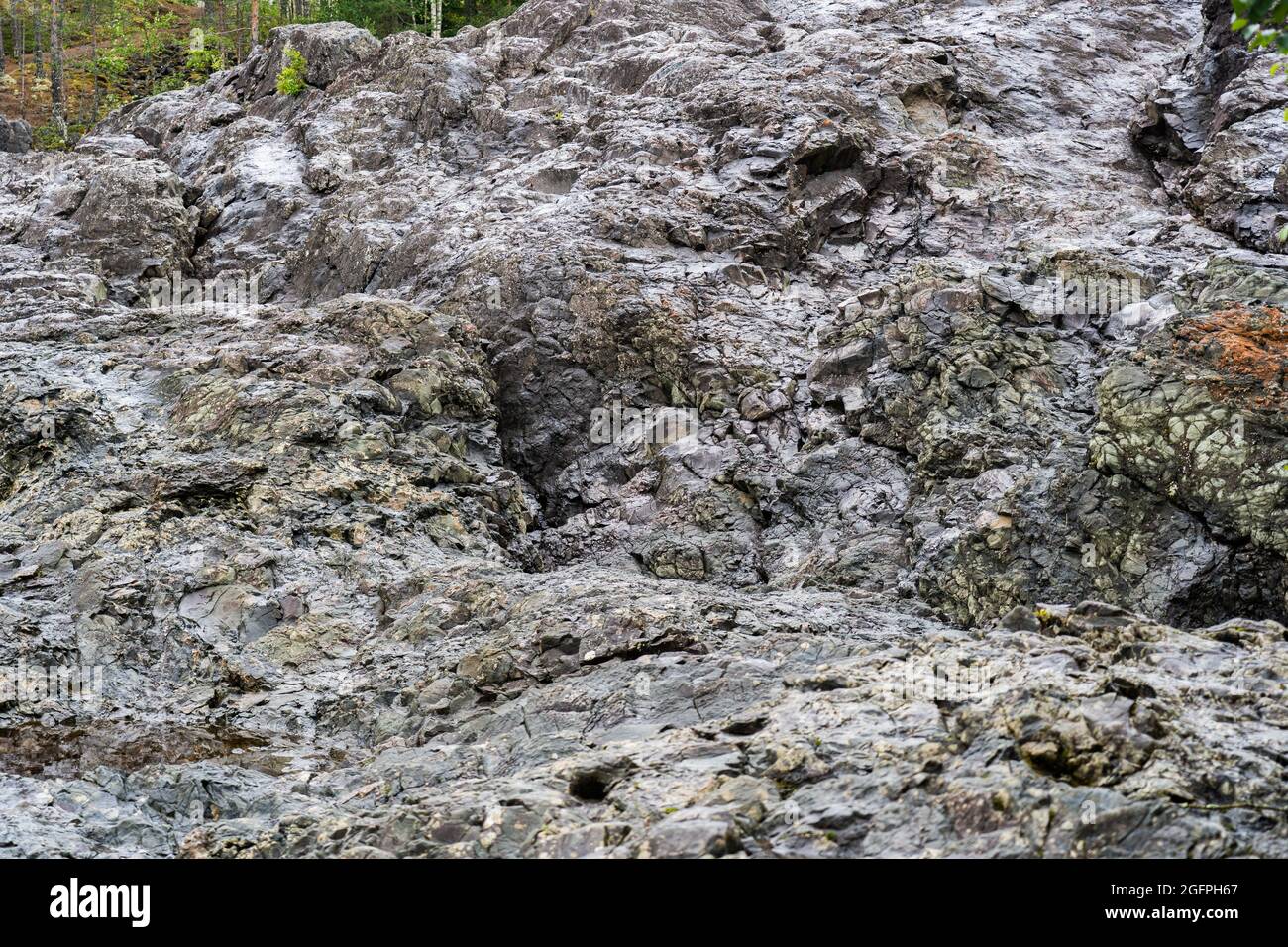 Rocks of extinct ancient paleo-volcano Girvas in Karelia, Russia Stock ...