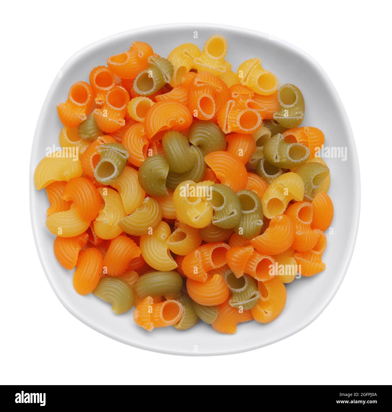 Pasta in plate on white background Stock Photo - Alamy