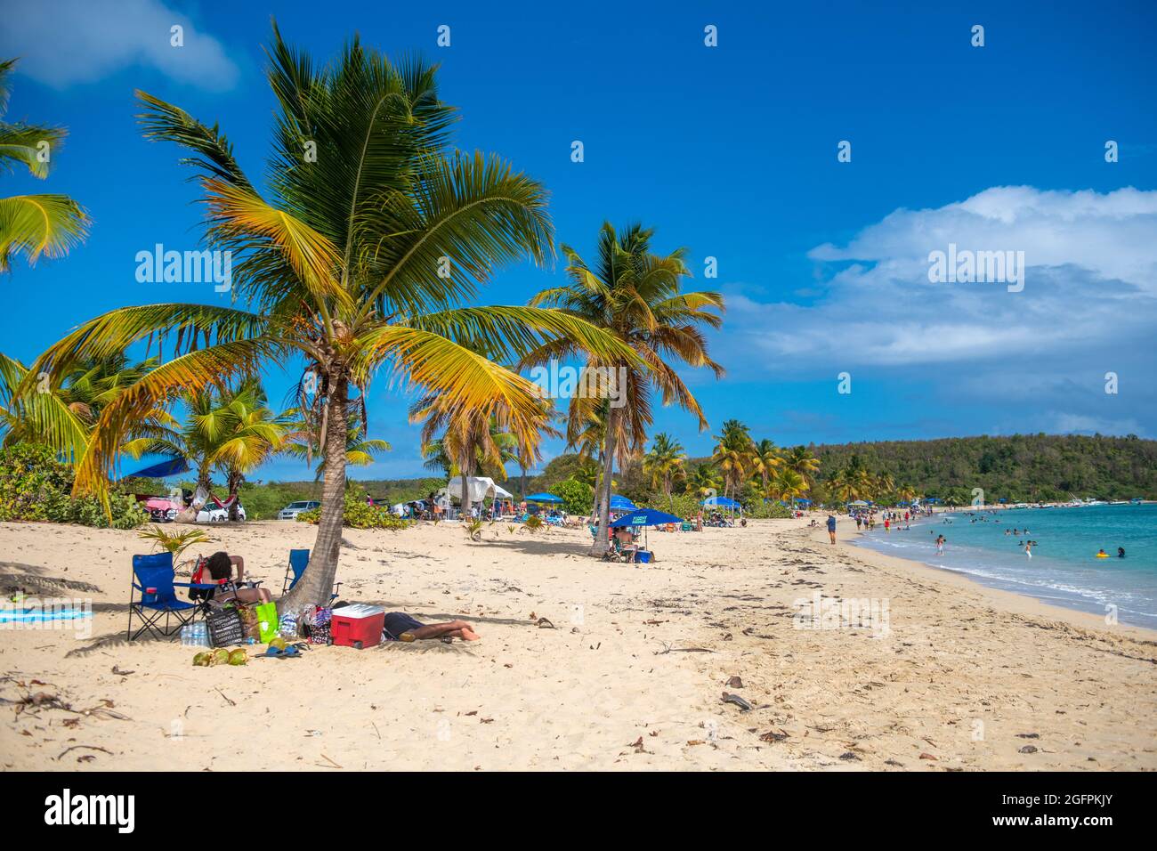 People enjoying a sunny day at the beach - Puerto Rico Stock Photo - Alamy