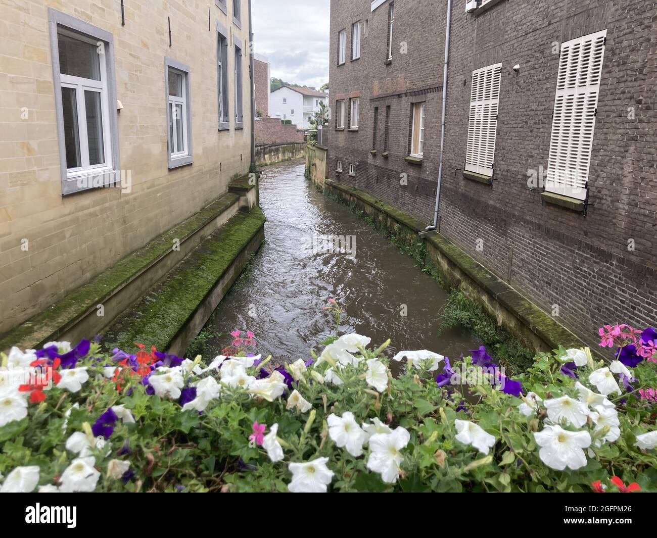 VALKENBURG, NETHERLANDS - Aug 07, 2021: The Geul river passing through ...