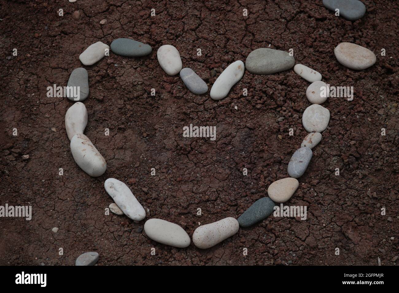 Stones forming heart hi-res stock photography and images - Alamy