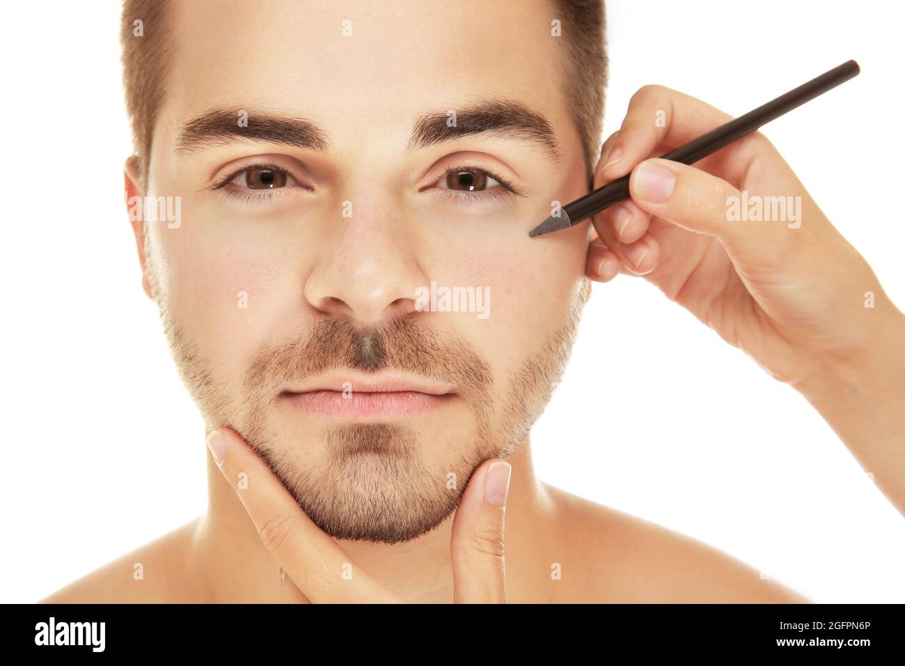 Plastic surgery concept. Female hand marking face before operation ...