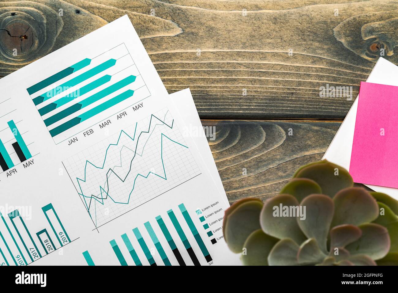 Office workplace table with report pages with financial data Stock ...