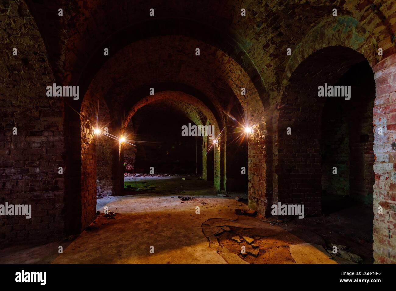Vaulted red brick dungeon under old castle Stock Photo - Alamy