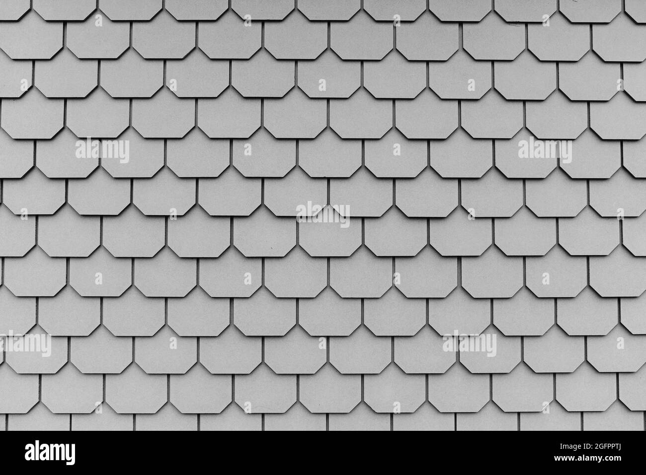 Fragment of gray octagon-shaped roof tiles Stock Photo - Alamy