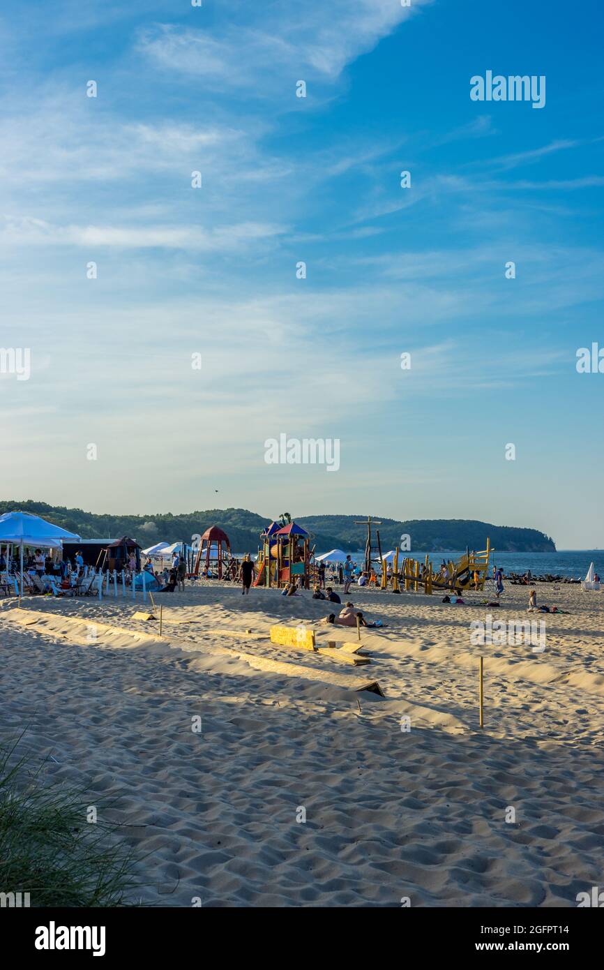 SOPOT, POLAND - Jun 20, 2021: A vertical shot of a sandy beach with ...