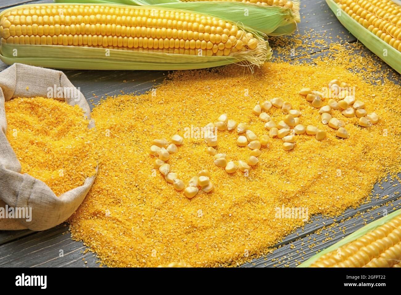 Word CORN made of grains on cornflour background Stock Photo - Alamy